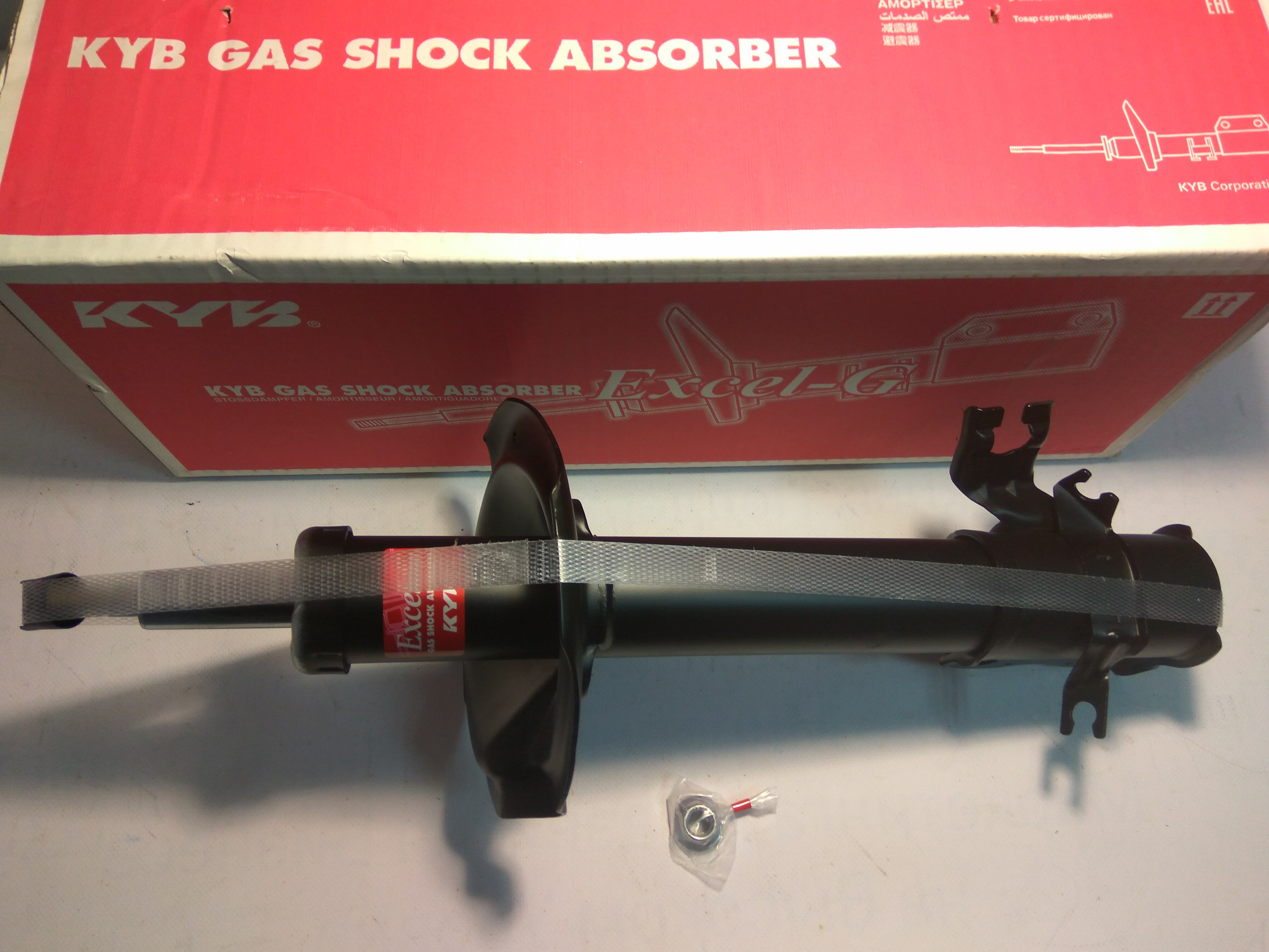 Передний левый амортизатор Nissan X-Trail T30 (2001-2007) KYB 334361 ...